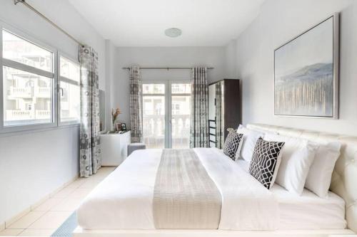 Contemporary 2BR w/ Maid's Room at JVC, Dubai (updated prices 2024)