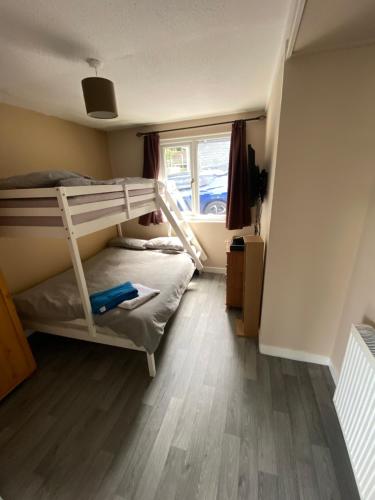 Stunning 3 Bed Riverside Cabin in Snowdonia, Caeathro (updated prices 2024)