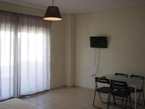 STUDIO α ΟΡΟΦΟΥ ΜΕ ΘΕΑ ΣΤΟ ΒΟΥΝΟ, Karistos (updated prices 2024)