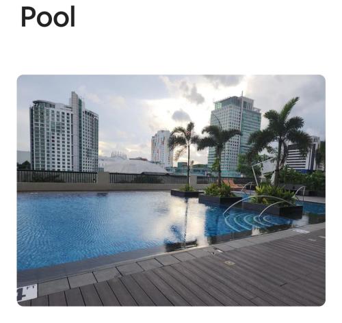 DG CONDOTEL @MANHATTAN PLAZA T2 STUDIO WITH BALCONY , 50 INCH TV AND ...