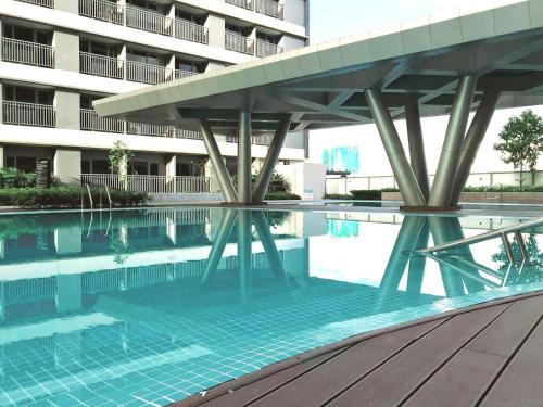 Cairong Inn Condominium pool TV with Netflix FAME RESIDENCES, Manila ...