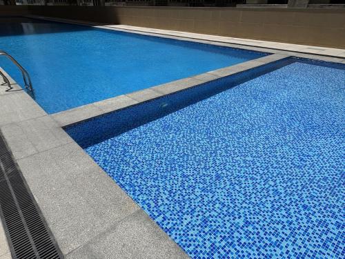 Sybay Suites twin double bed beside Okada near T3 MOA NAIA Ayala ...