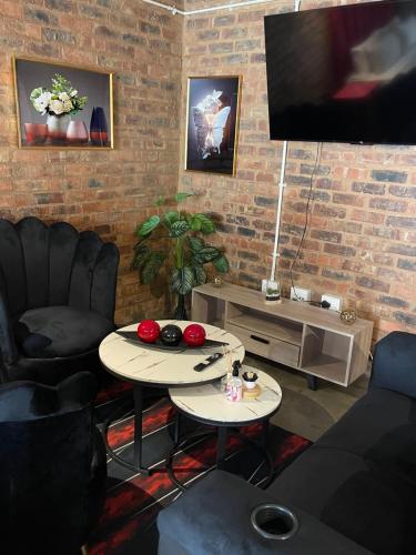 A Rosey Fresh Burgundy Hotel,‏ יוהנסבורג (מחירים מעודכנים ל-2025)