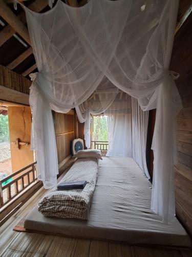 Muong Bi Homestay - a wooden stilt house owned by Uncle Lon in Luy Ai ...