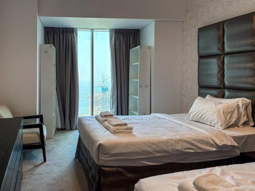 Cayan Tower, Dubai Marina - Onelink, Dubai (2026 güncel fiyatları)