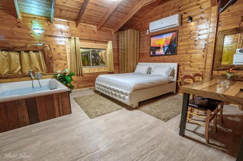 צימרו בקתות העץ של מרו, Nof Kinneret (harga dikemas kini 2026)