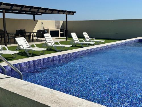 Modern apartment overlooking the ocean in front of the esplanade ...