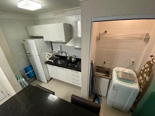 Apto em Bombas com jacuzzi privado, piscinas, gym completo, sauna ...