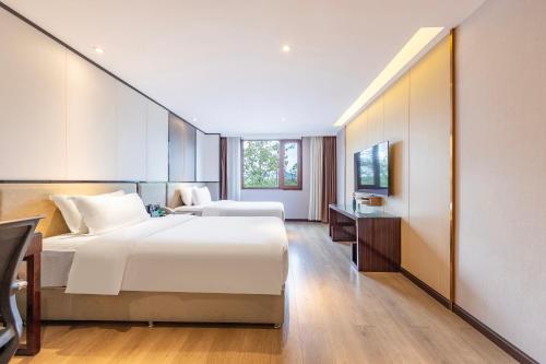 Meishan Dongpo Muzi Hotel, Meishan (precios actualizados 2026)