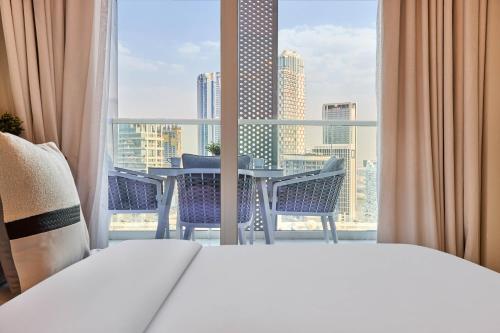 杜拜的Reva Residences 1BR - Near Downtown Dubai & Canal Walk（2026 年最新房價）