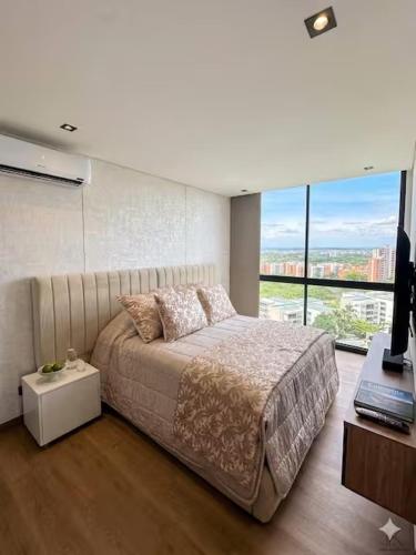 Lujoso Apto Moderno con AC, Balcón, Piscina, Cine y Gym，卡利（2026最新房价）