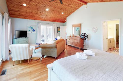 Lakefront home with granite counters, fireplace, lake views, & dock ...