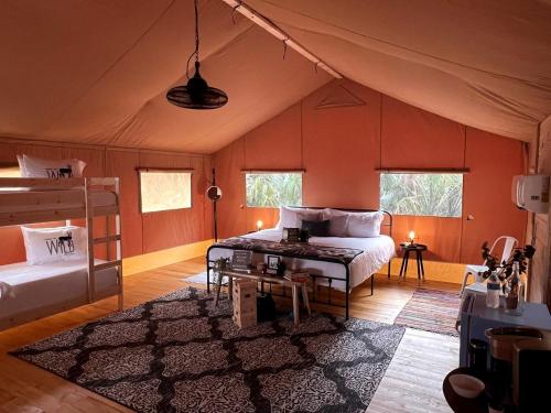 Deluxe Safari Tent with Hammocks & Fire Pit Retreat in Basinger ...